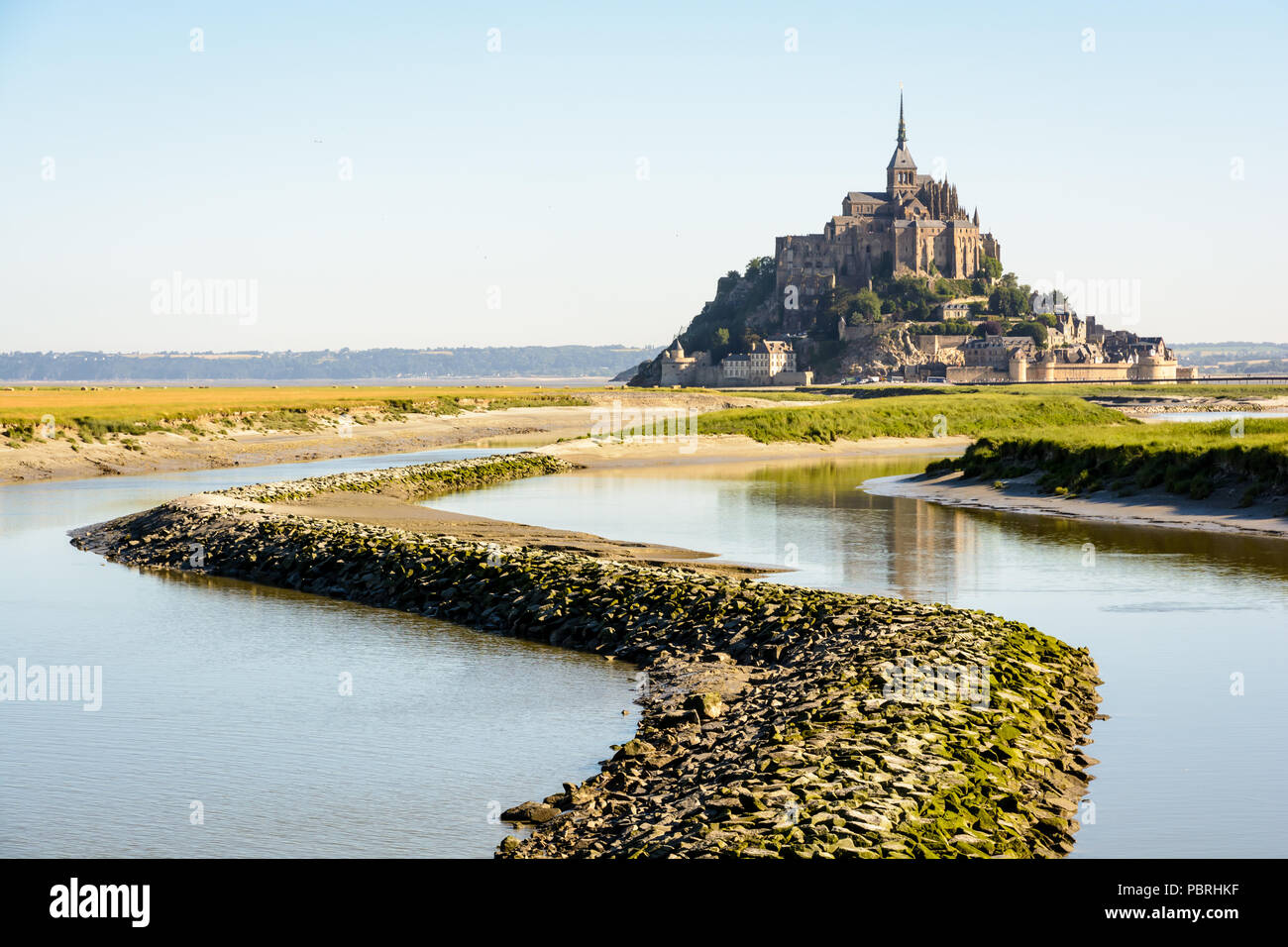 The Mont Saint-Michel tidal island, located in France in Normandy, at ...