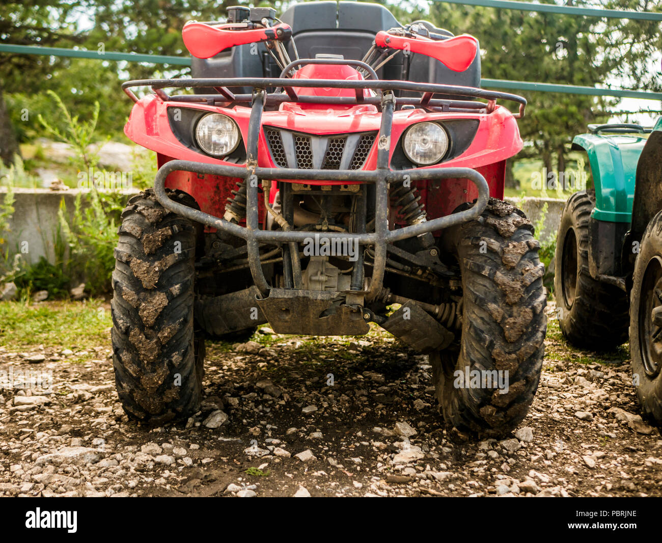 atv in a mountain parking zone on a rainy summer day Stock Photo - Alamy