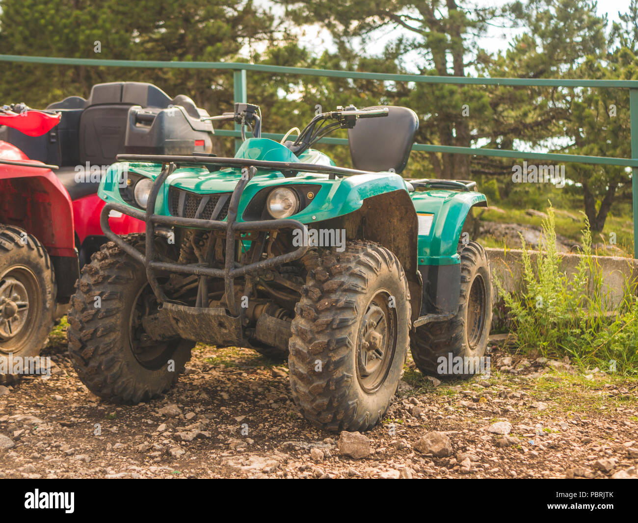 close up atv quad bike on a diry ground summer season Stock Photo - Alamy
