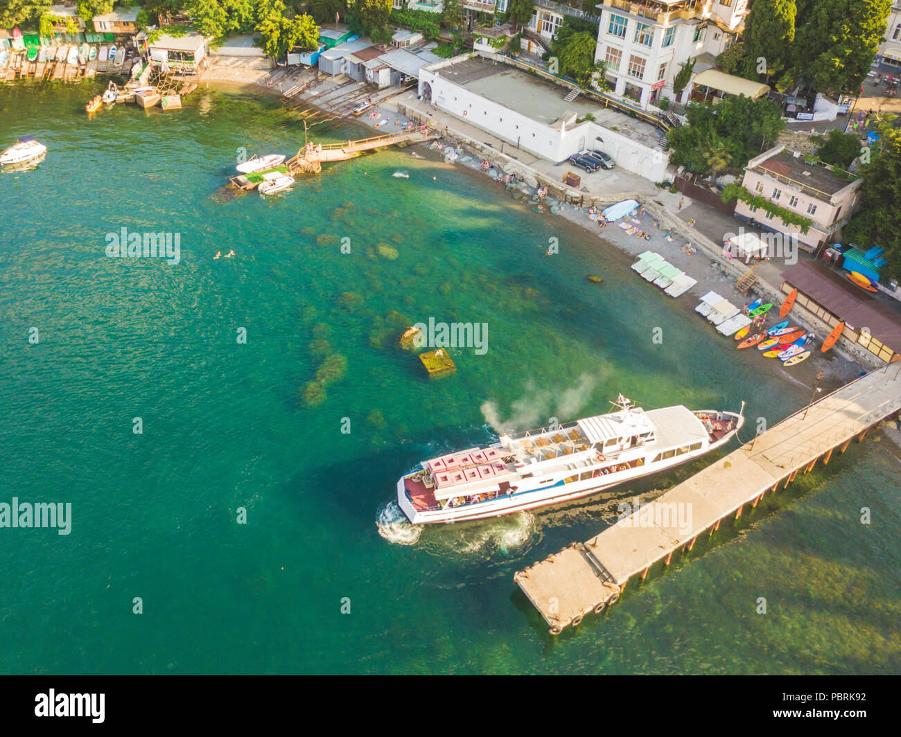 aerial top view of ferry motor boat parking in the bay pier Stock Photo ...