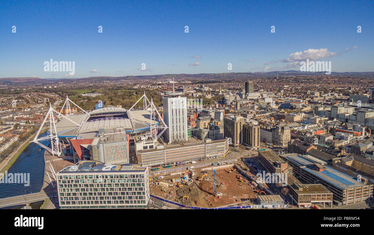 Aerial views over Cardiff Central Station, Central Square and the city ...