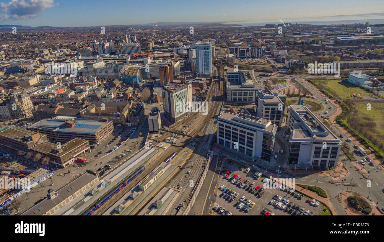 Aerial views over Cardiff Central Station, Central Square and the city ...