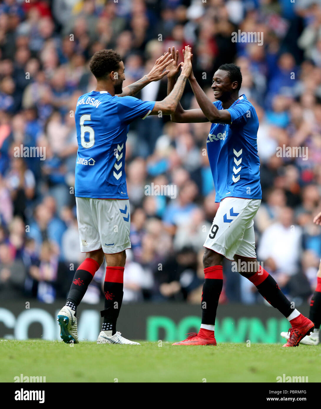 Rangers Sadiq Umar (right) celebrates with Connor Goldson after Wigan ...