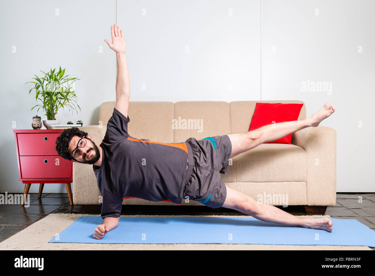 Side Plank Man Exercise Stock Photos & Side Plank Man Exercise Stock ...