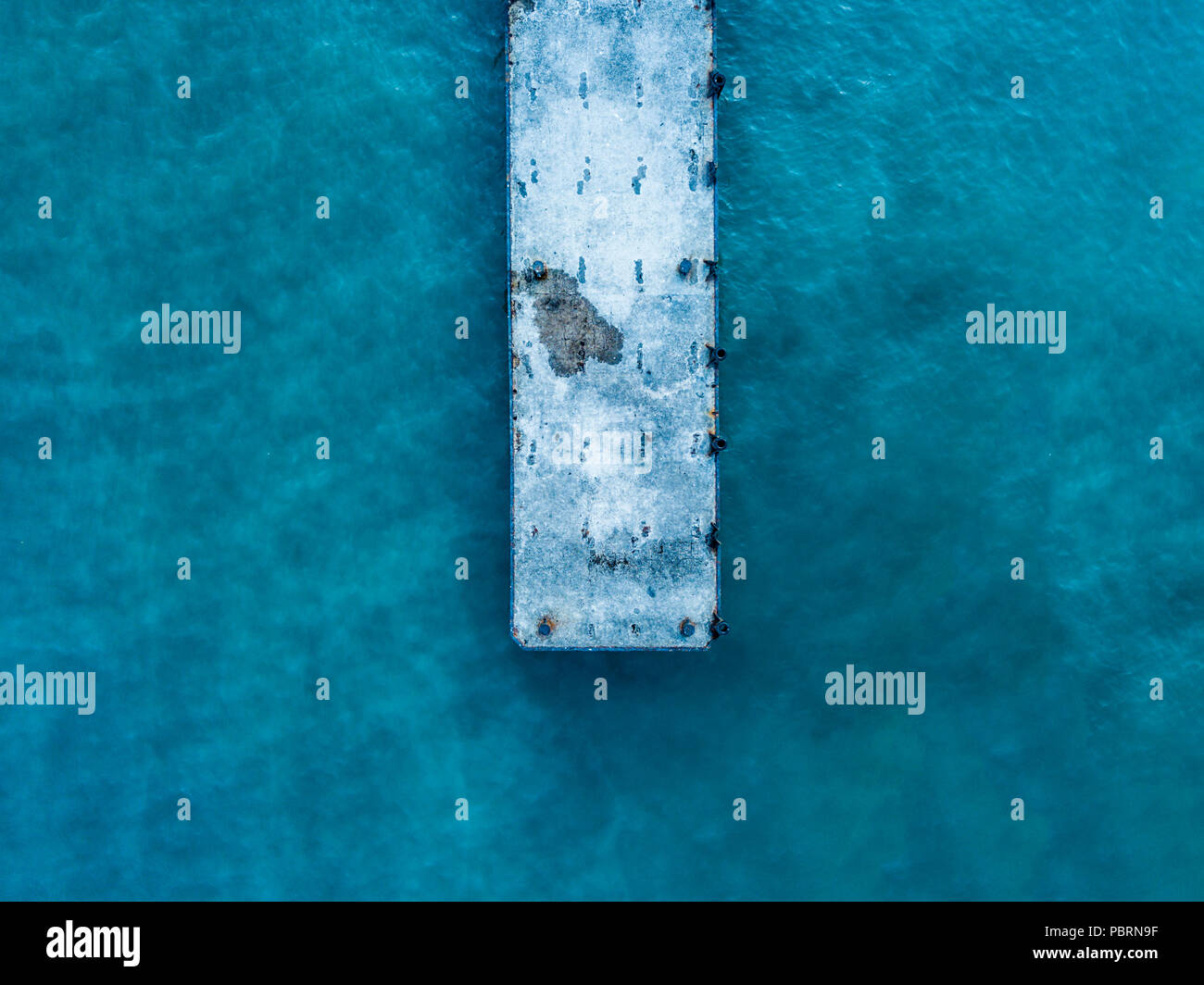 close up overhead view of ocean sea pier simple concept isolated design ...