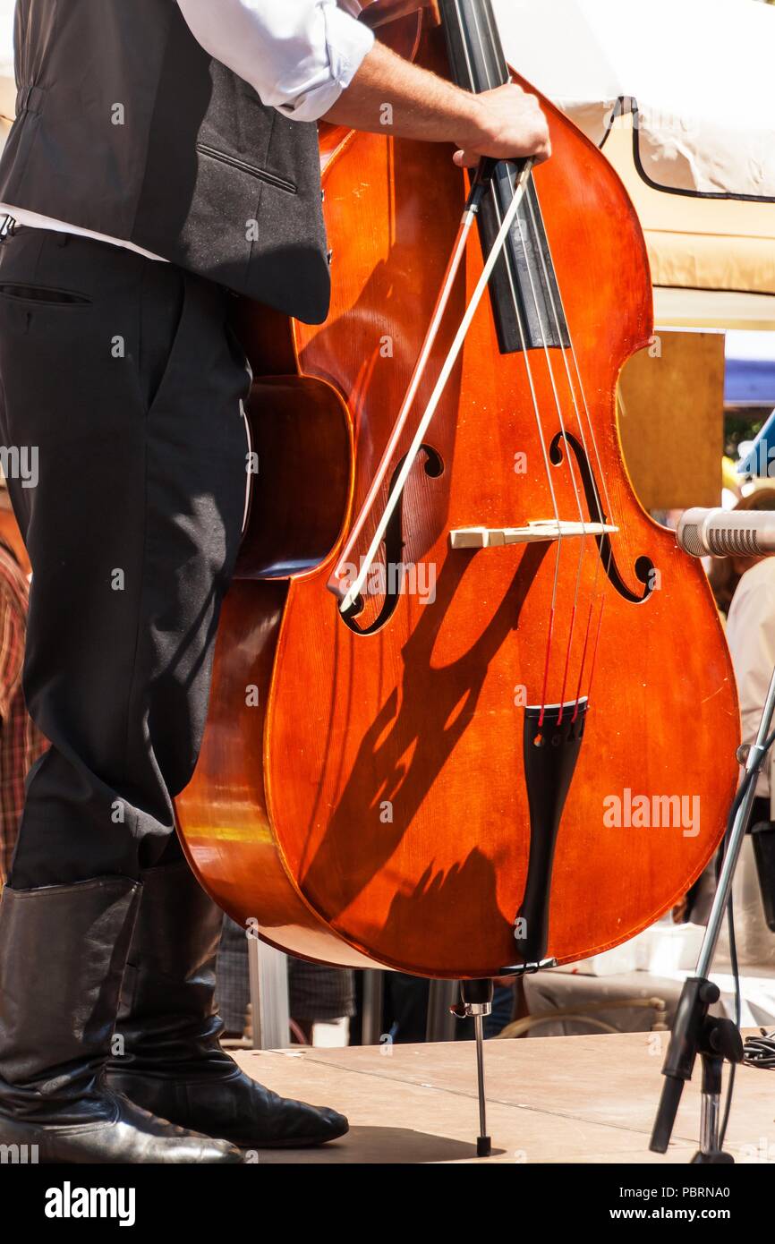Detail of bass musical instrument. Artistic performances at folk ...