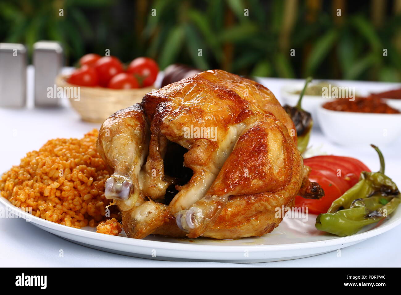Whole Roasted chicken meat, rice and vegetables Stock Photo - Alamy