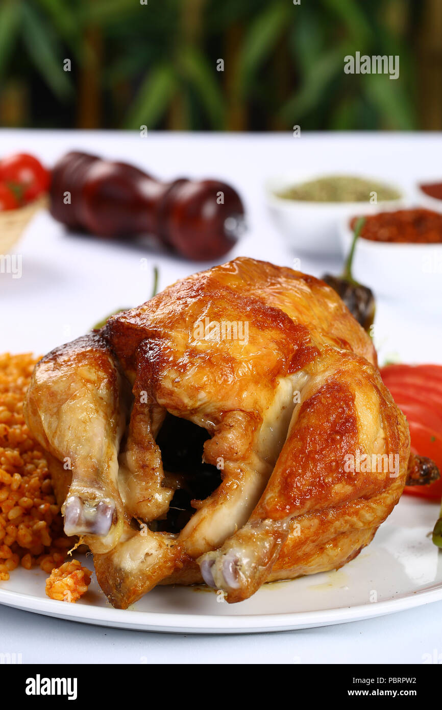 Whole Roasted chicken meat, rice and vegetables Stock Photo - Alamy