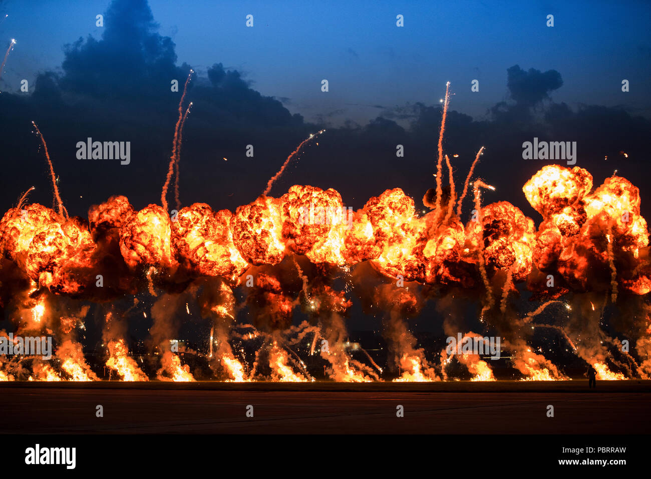 Airshow demonstrations with high explosive fire blasts Stock Photo - Alamy