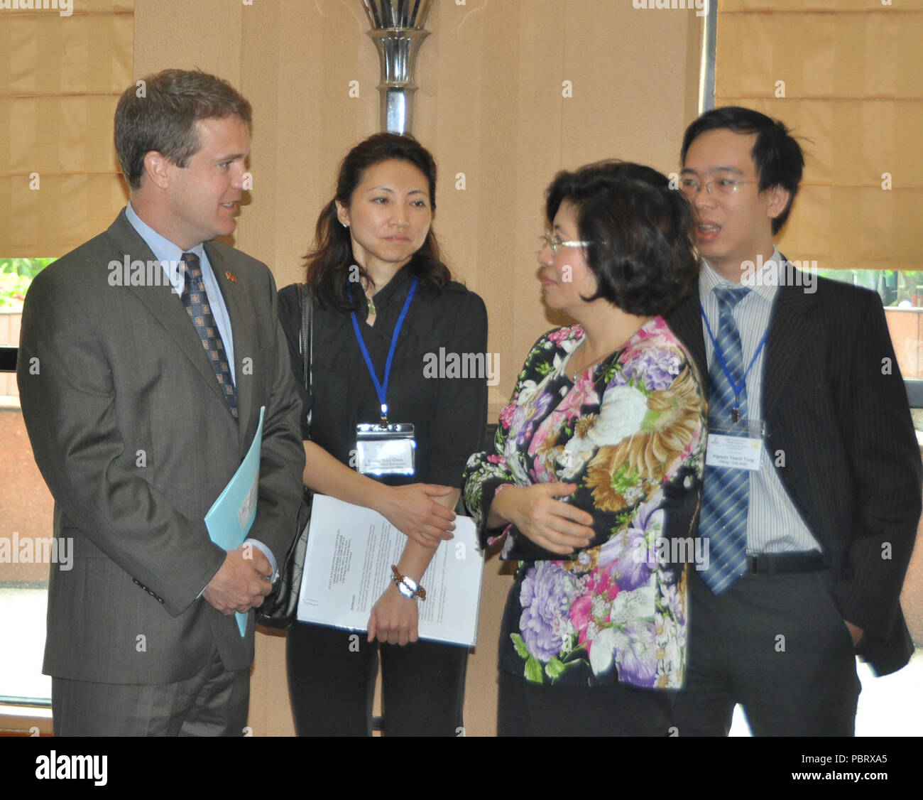 Acting Senior Deputy Assistant Administrator Jason Foley of USAID (left ...