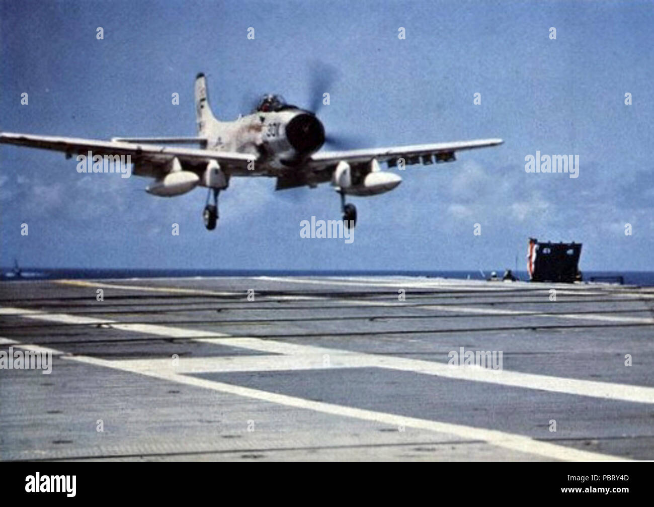AD-6 of VA-52 landing on USS Ticonderoga (CVA-14) 1960 Stock Photo - Alamy
