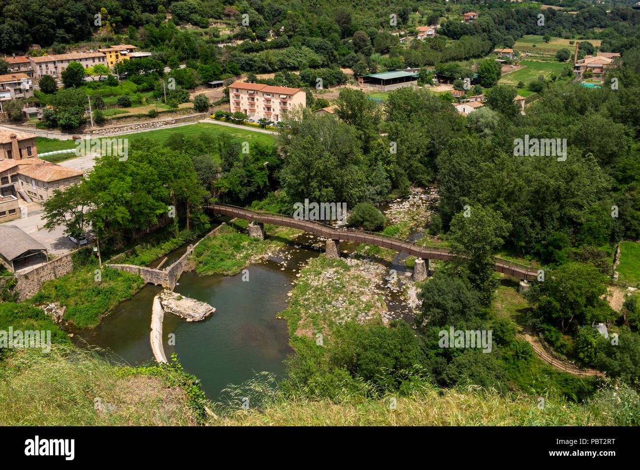 Views over the fertile valley along the river Fluvia from the town of ...