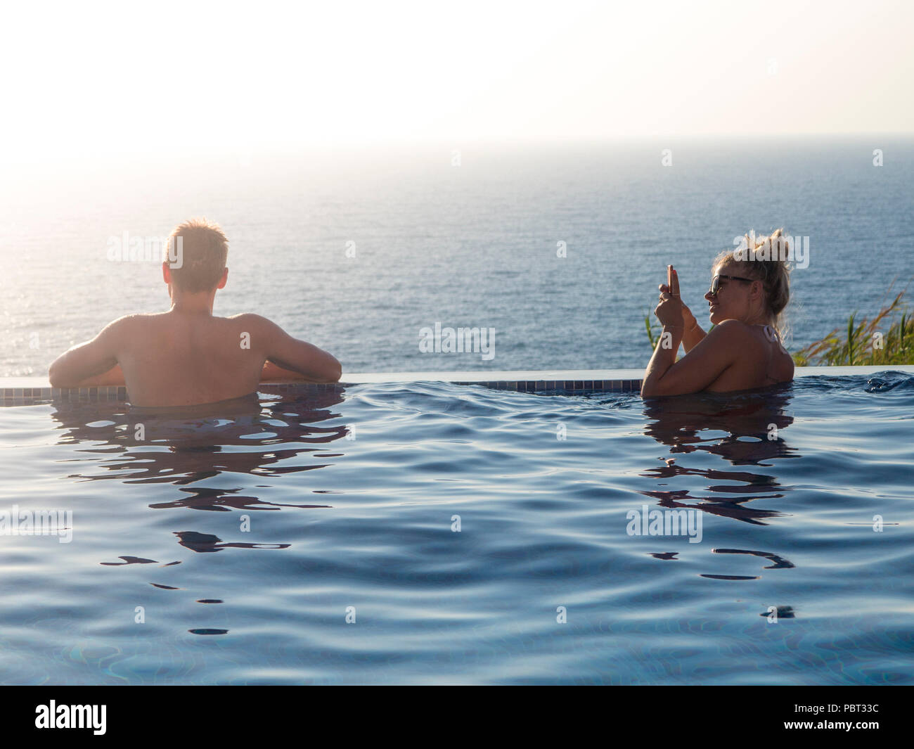 Intimate swimming couple romance hi-res stock photography and images ...