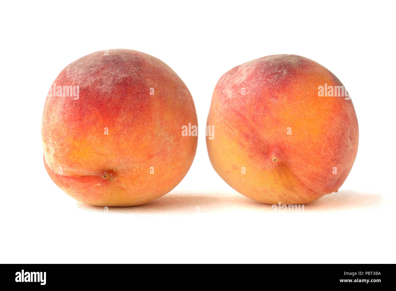 Pair of fresh peaches on white background for design Stock Photo - Alamy