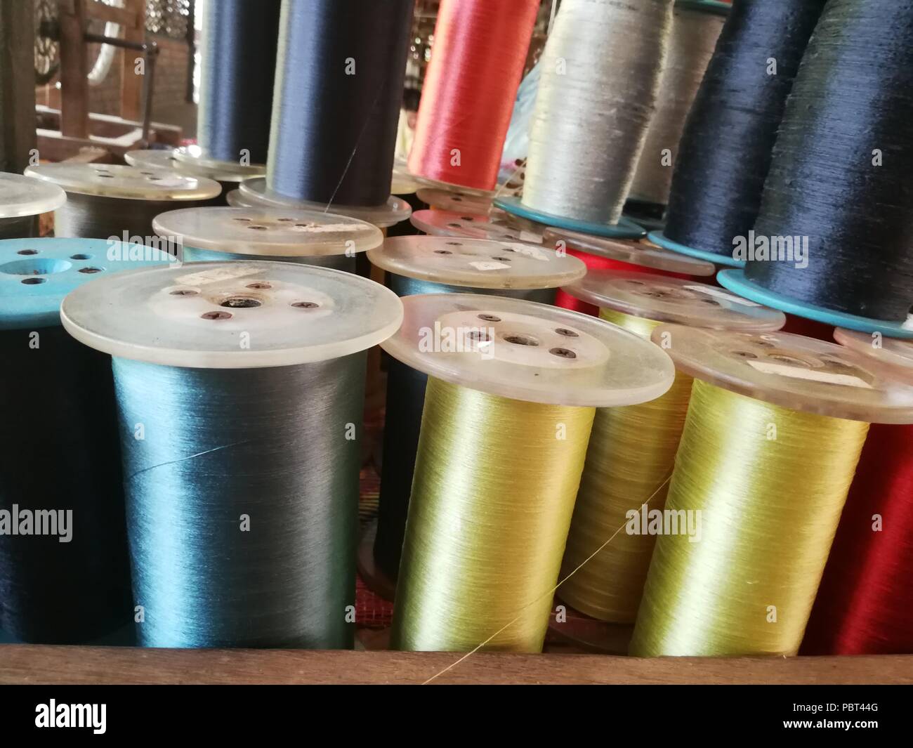 Silk thread coils Stock Photo - Alamy