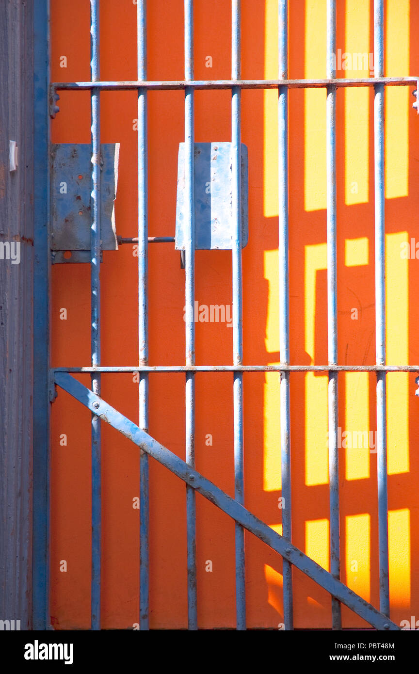Secure bright orange door hi-res stock photography and images - Alamy
