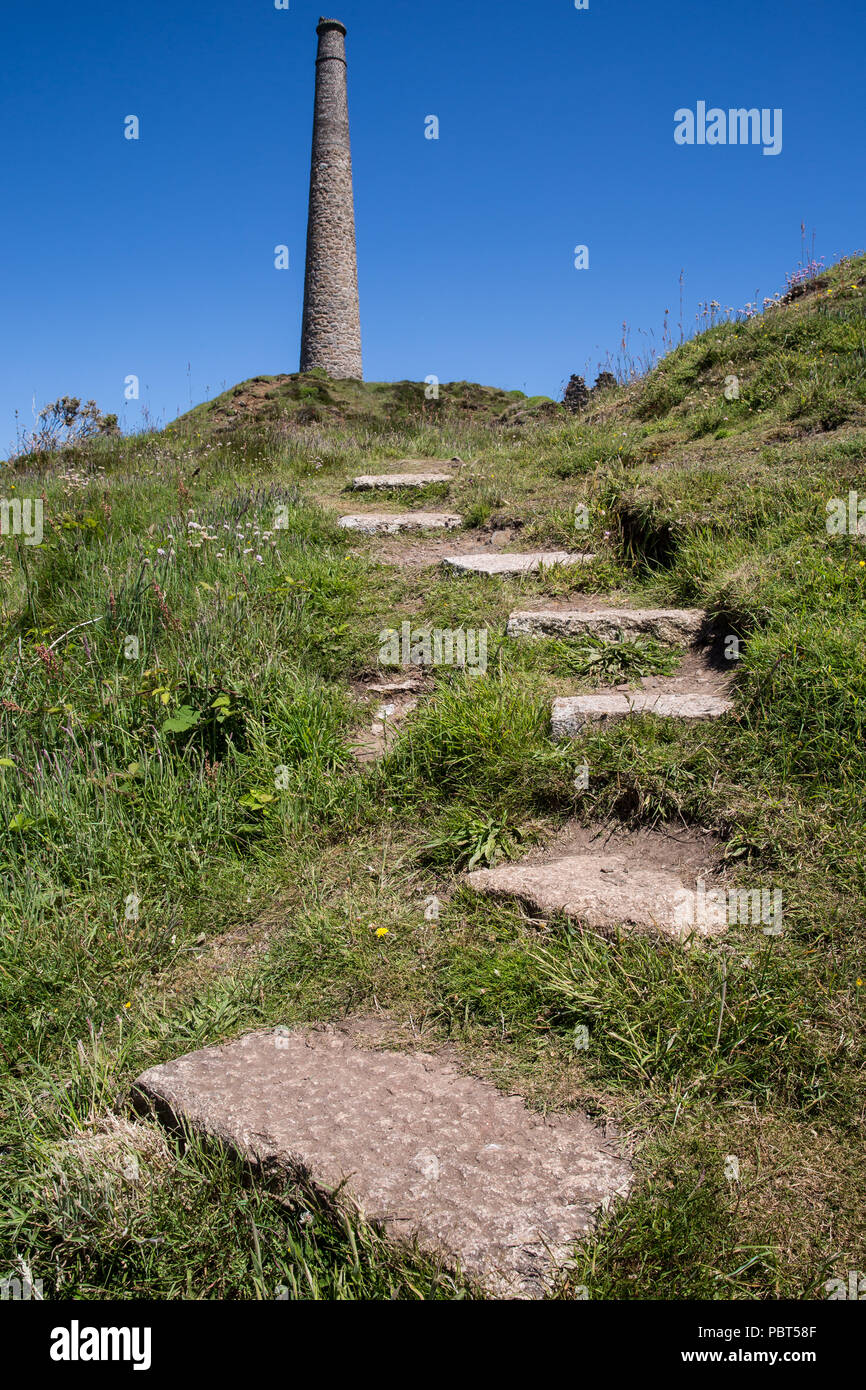 The derelict buildings of abandoned Cornish tin mines overlooking the ...