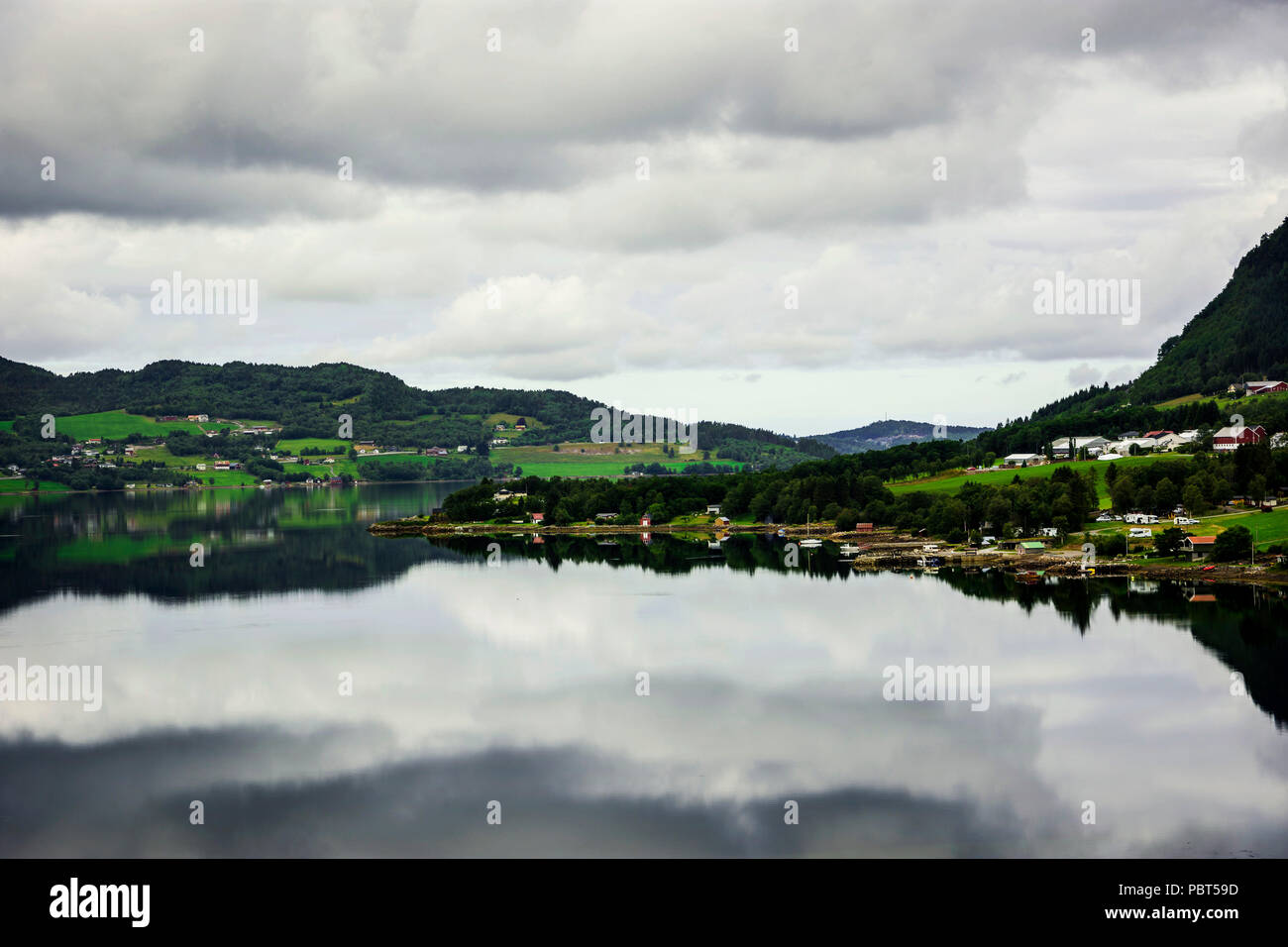 Lake and village in the county of More og Romsdal, Norway Stock Photo ...