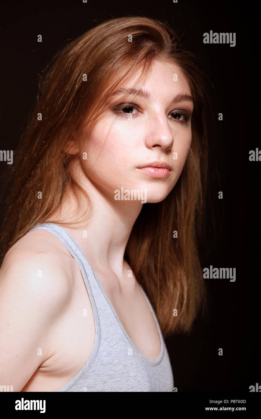 Upper Body One Young Teenage Girl Wearing Top Fashion Model Black Background Side Profile