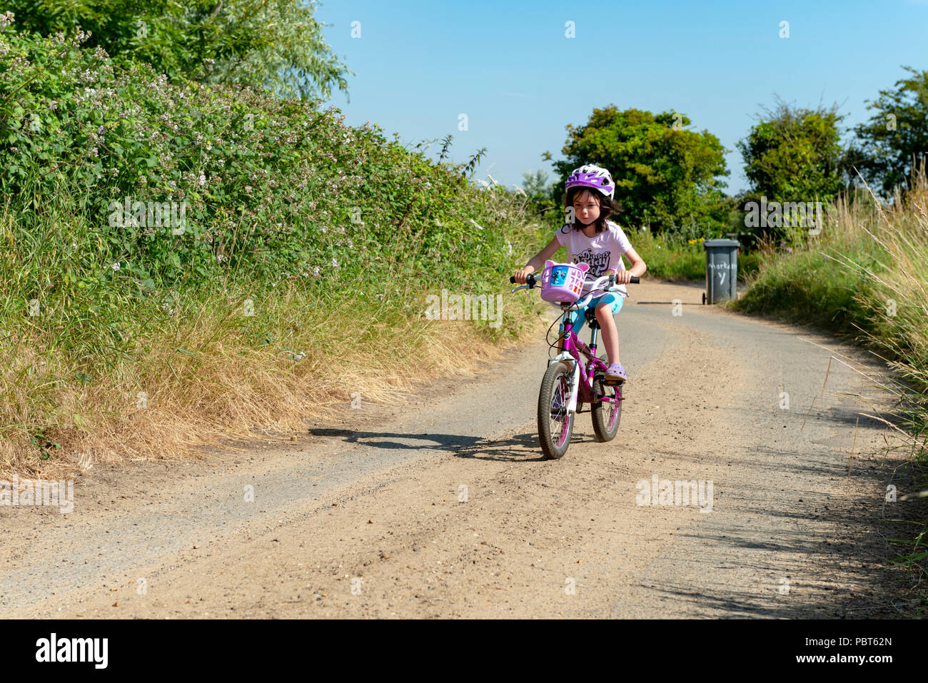 Girl riding cycle hi-res stock photography and images - Alamy