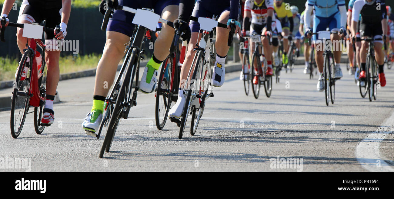 professional road cycling race with many athletes Stock Photo - Alamy