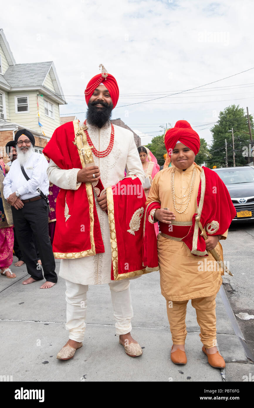 The Sikh groom arrives at the temple for his wedding accompanied by his ...