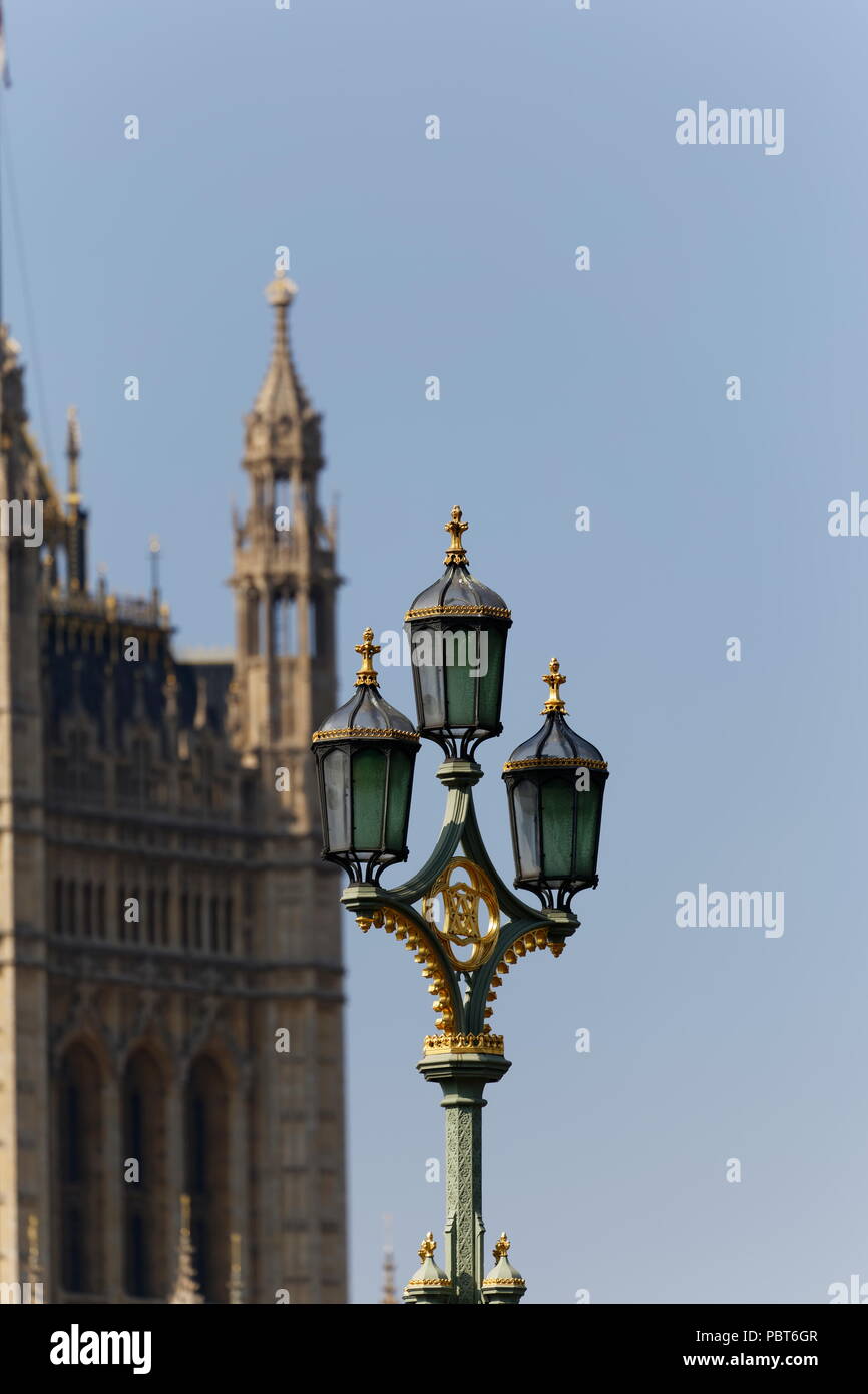 Lamp post on Westminster Bridge and Houses of Parliment behind London ...