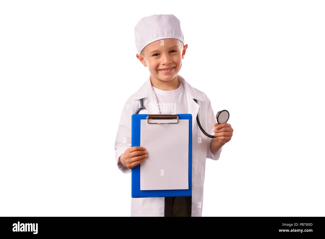 A little, smiling boy doctor in medical uniform, isolated on white ...