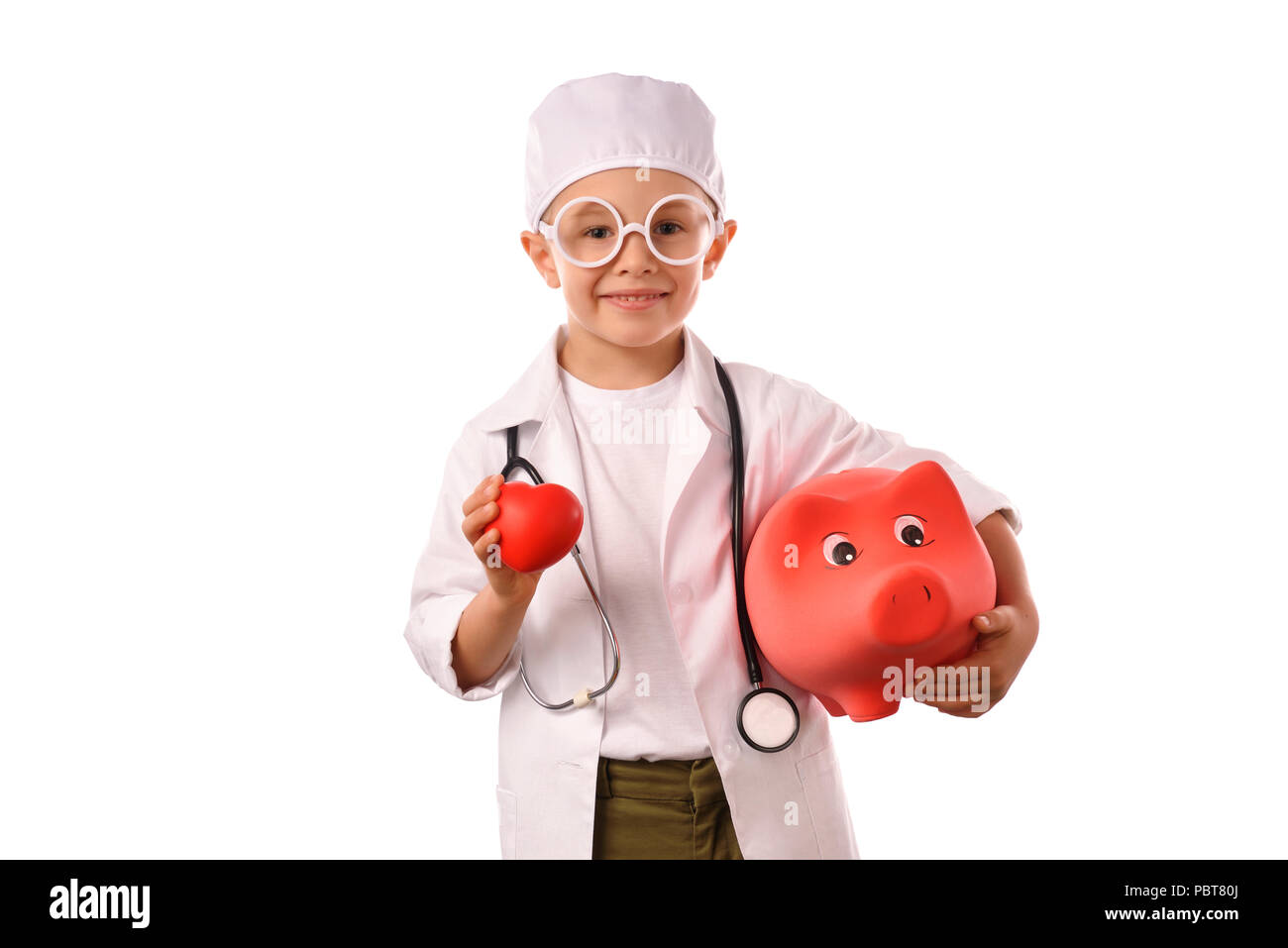 A little, smiling boy doctor in medical uniform, isolated on white ...