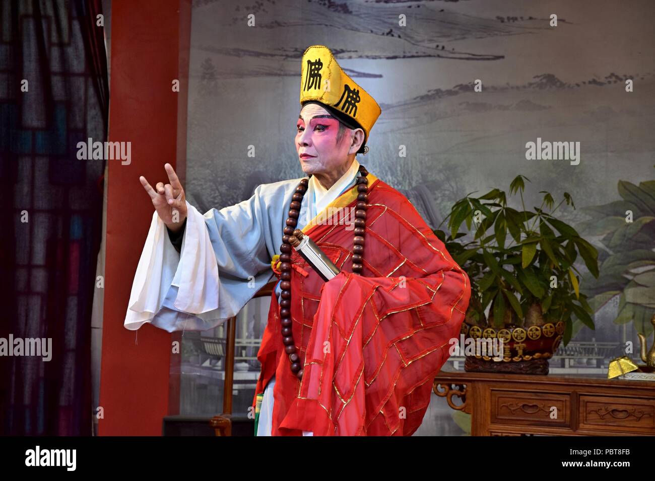 CANTON, CHINA – CIRCA JANUARY 2017: A singer of Cantonese opera during ...