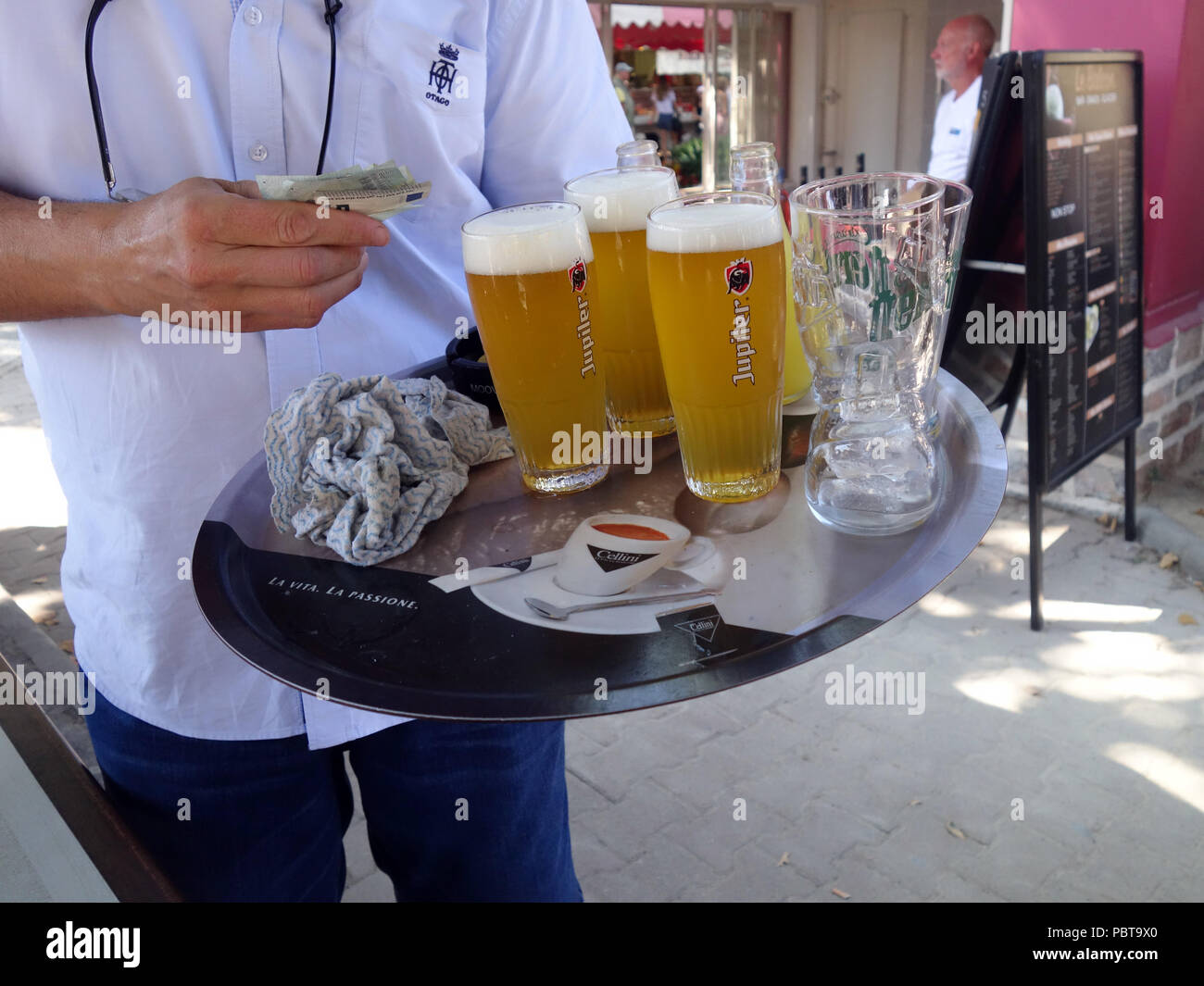 Carrying drinks in hand hi-res stock photography and images - Alamy