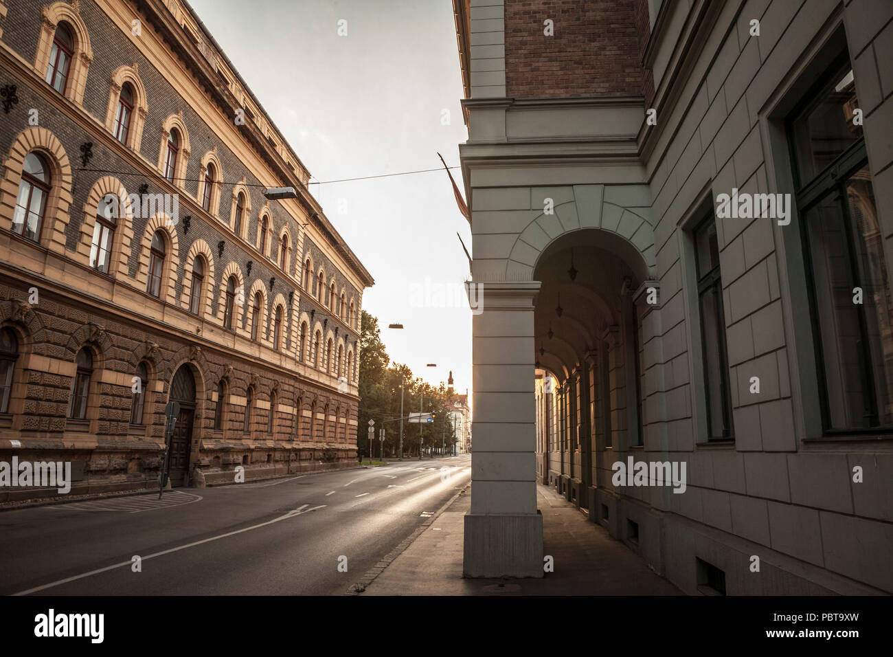 Street of the city center of Szeged, Southern Hungary, surrounded with ...