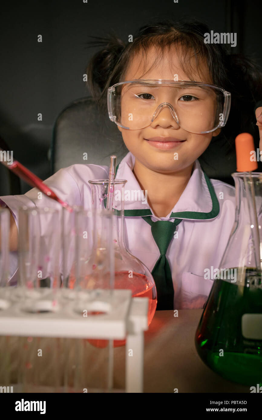 children leaning about chemistry in science examination laboratory ...