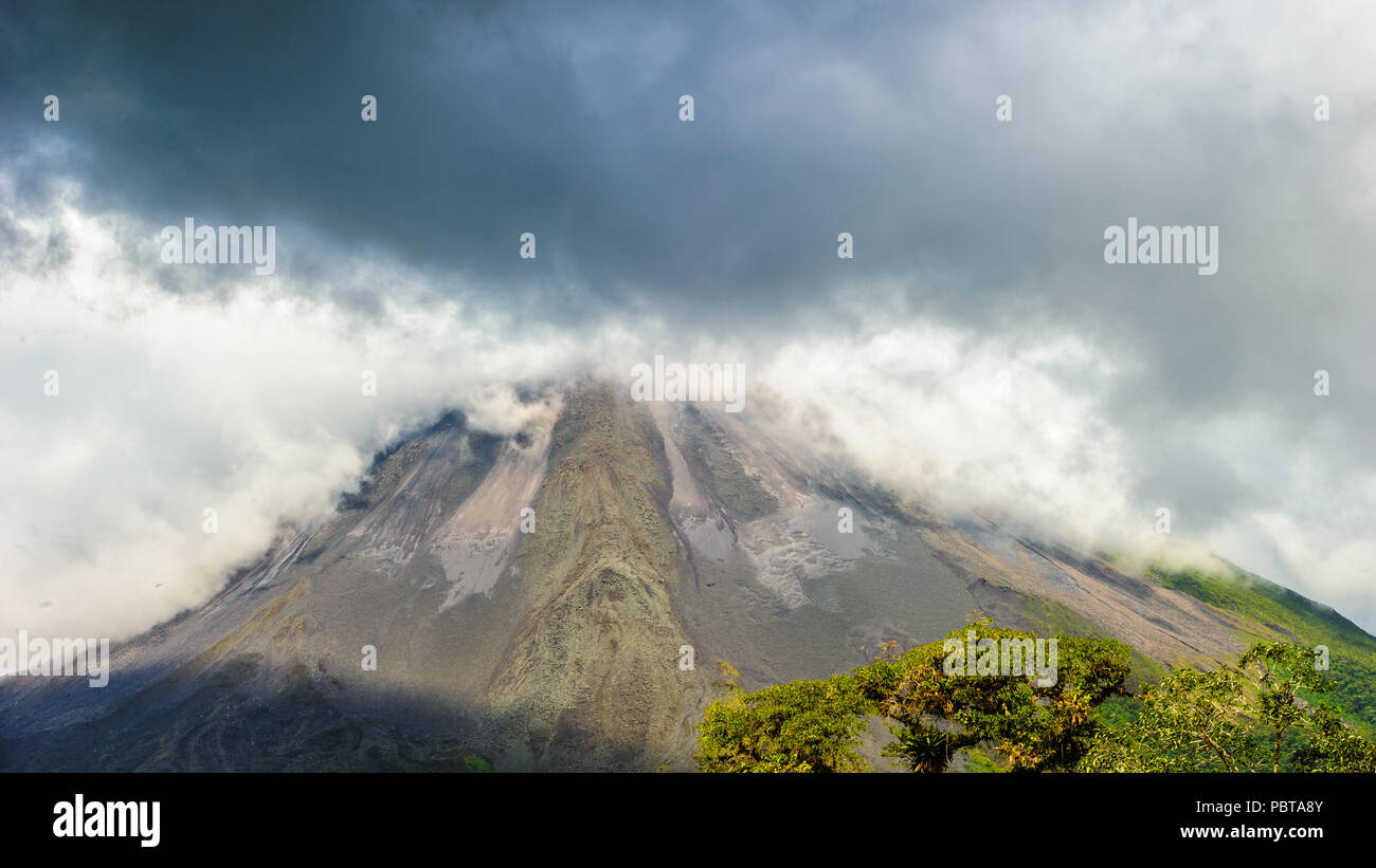 Volcano and the dark sky Stock Photo - Alamy