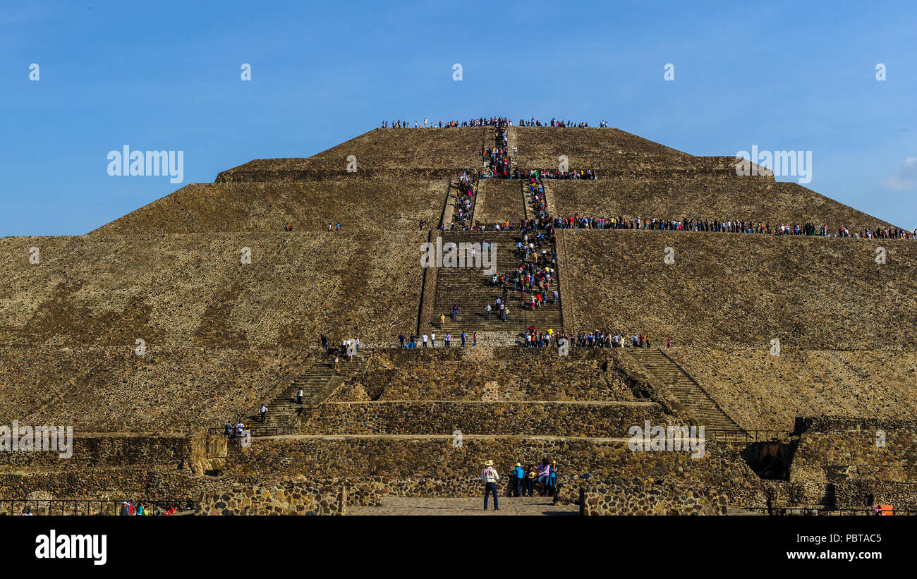 People go into the Pyramid of Sun of the Pre-Hispanic City of ...
