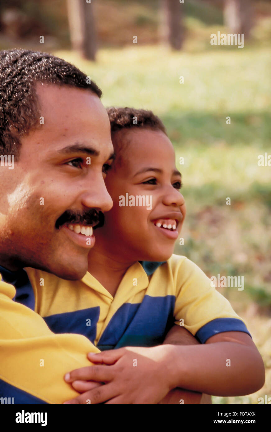 Father and son looking into the distance MR © Myrleen Pearson ...