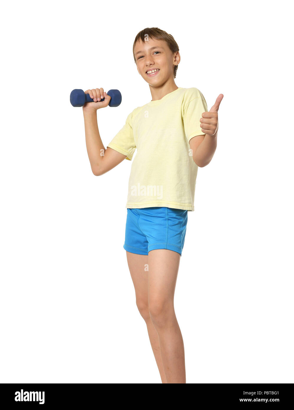Young boy doing exercises Stock Photo - Alamy