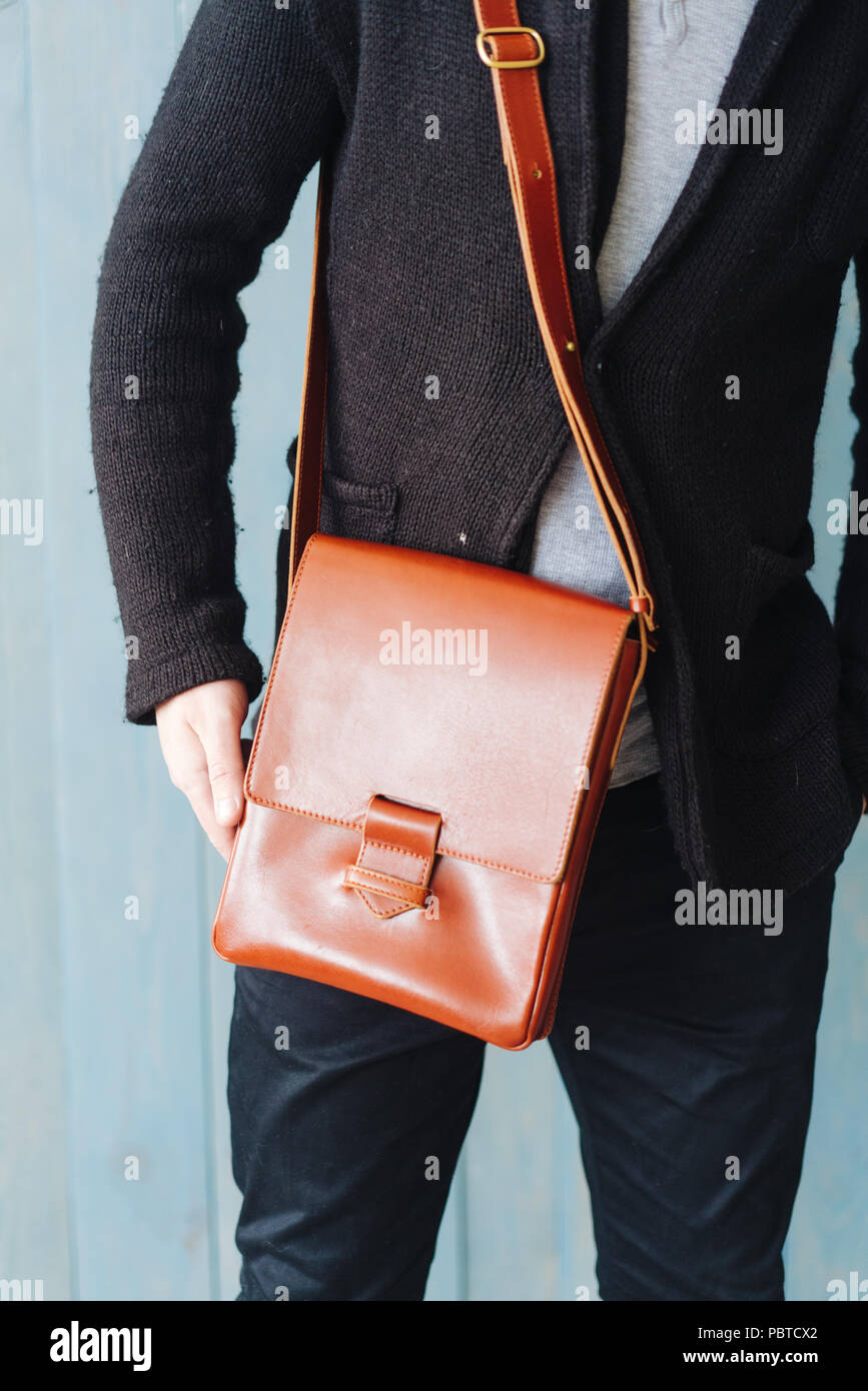 Handsome guy leather bag hi-res stock photography and images - Alamy