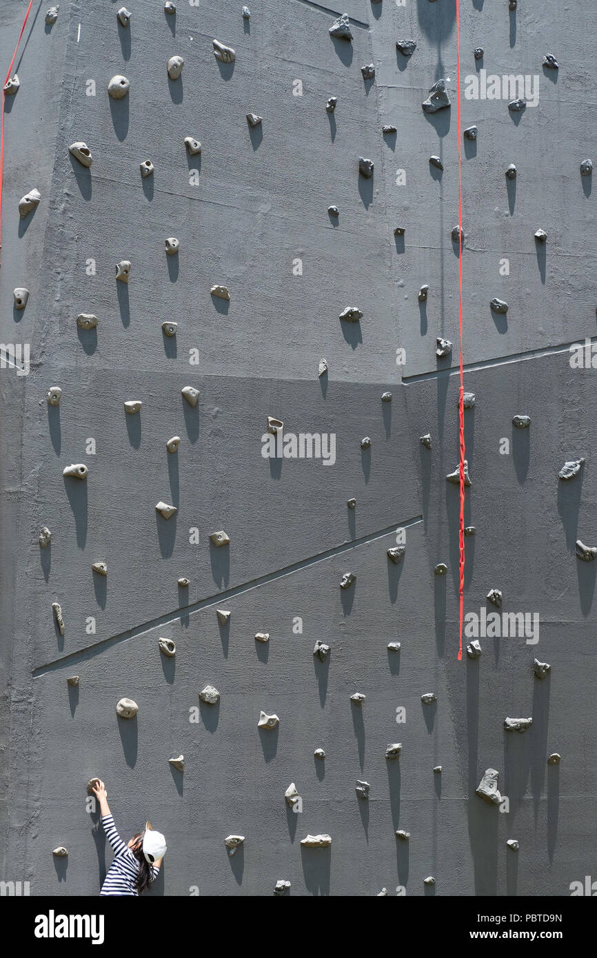 kid learn how to rock climbing Stock Photo - Alamy