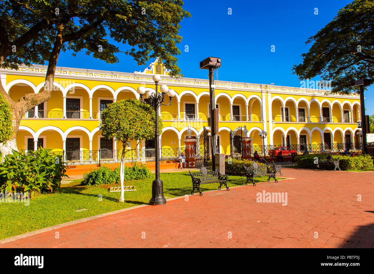 Yellow building of the main square (Zocalo) of Palenque, Mexico Stock ...