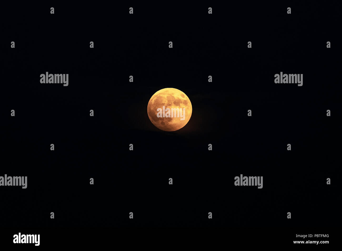 The shadow of the earth begins to cover the surface of the moon on the ...