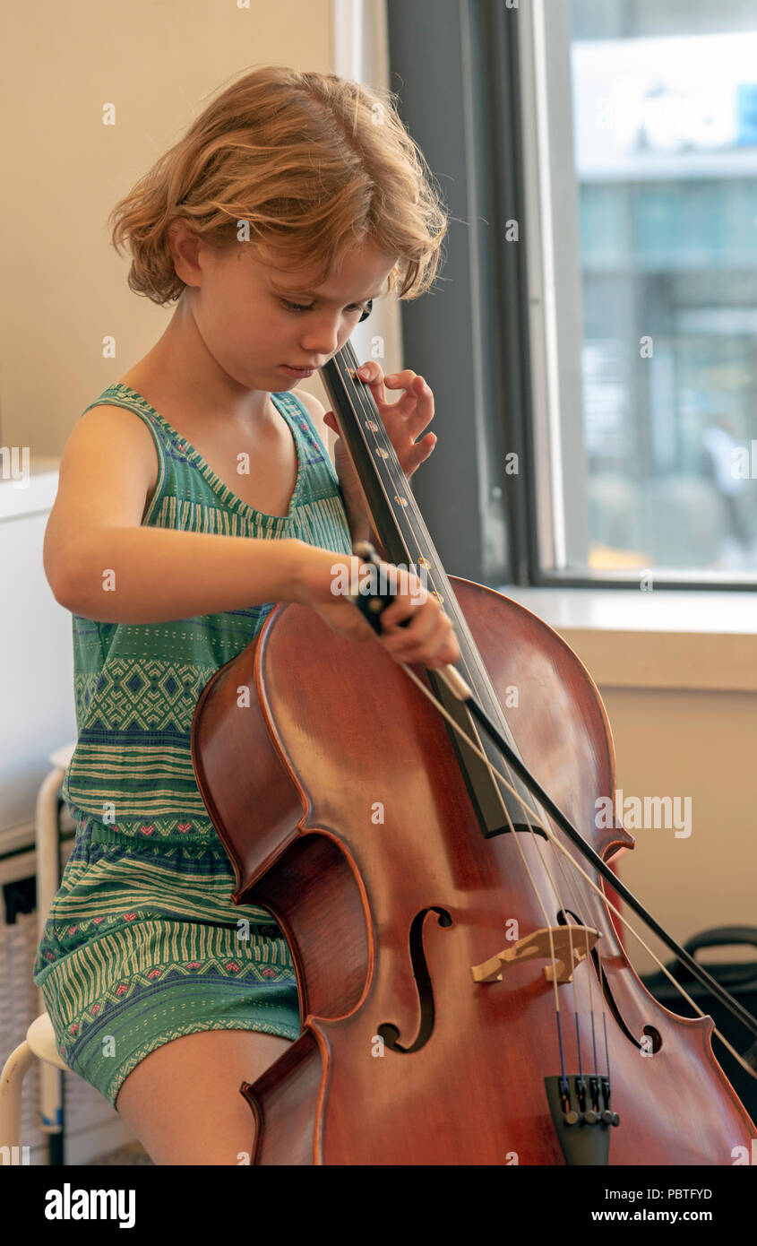 Student playing instrument hi-res stock photography and images - Alamy
