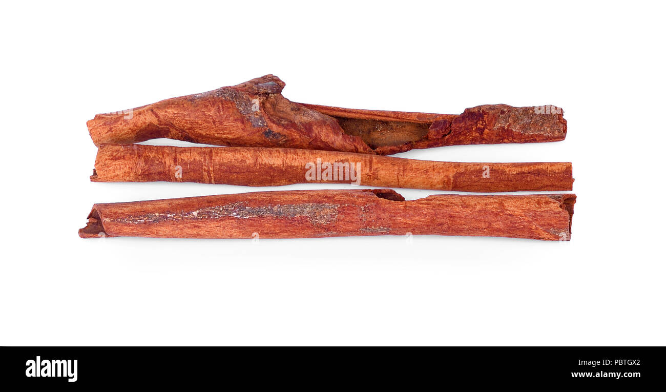 Cinnamon sticks on white background Stock Photo - Alamy