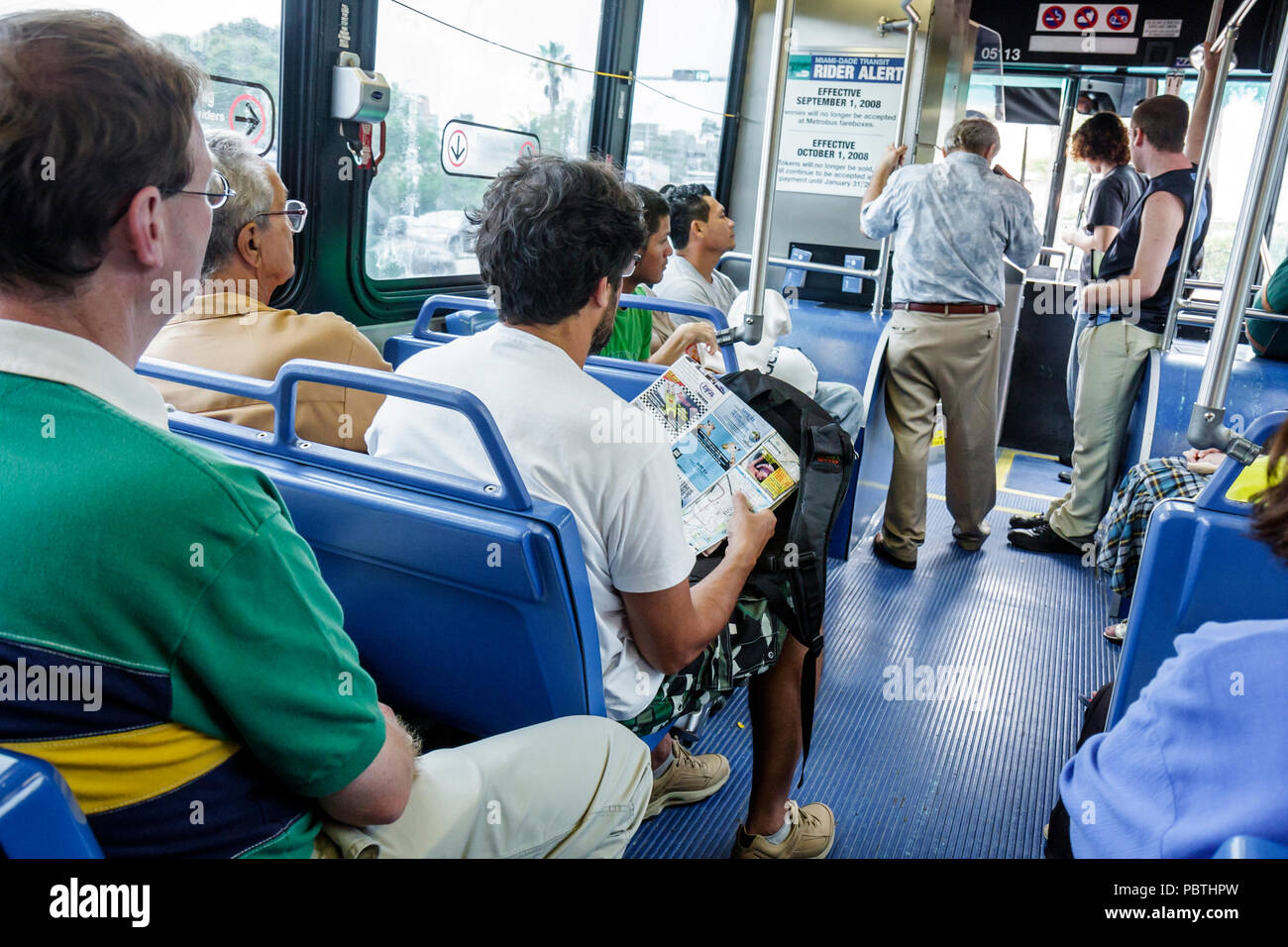Bus mass transit adult man passenger rider hi-res stock photography and ...