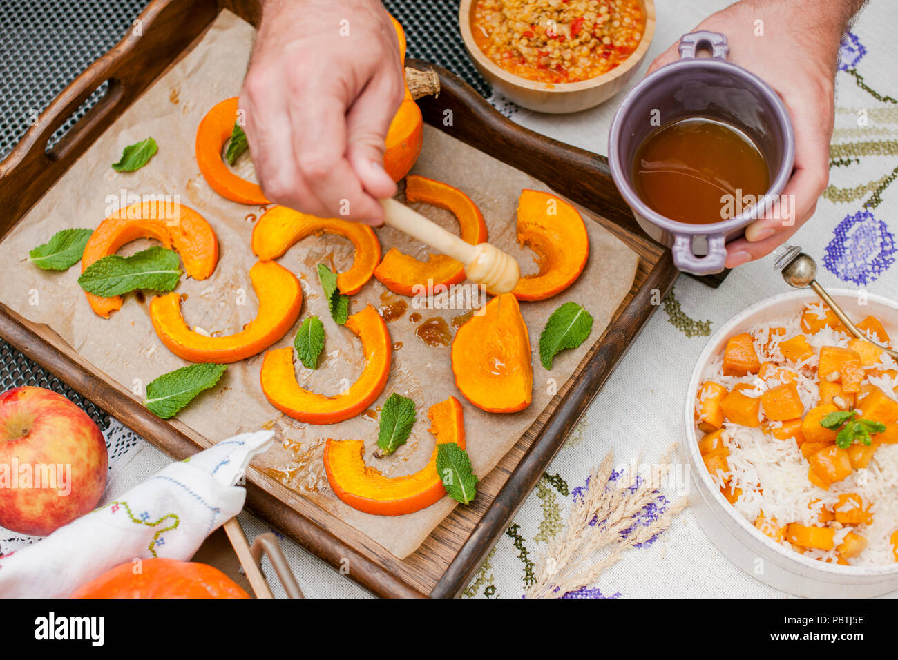 Sweet, baked pumpkin and pie with pear. Autumn dinner for the whole ...