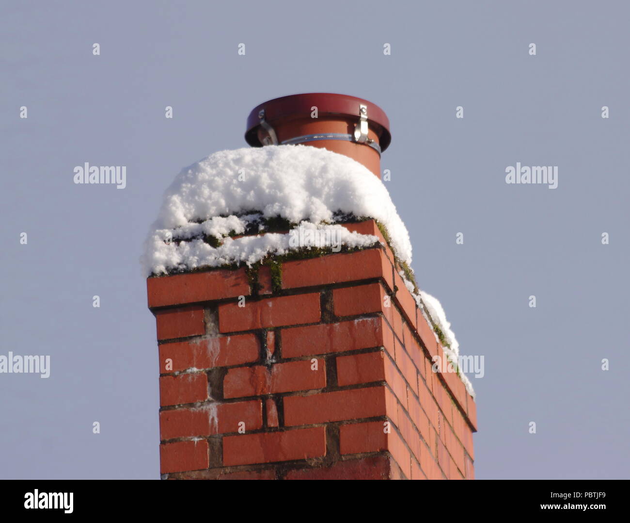 Chimney and snow Stock Photo - Alamy