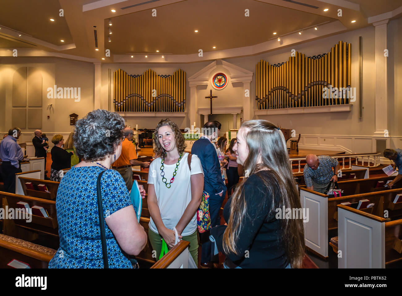 Pastor and congregational members Stock Photo - Alamy
