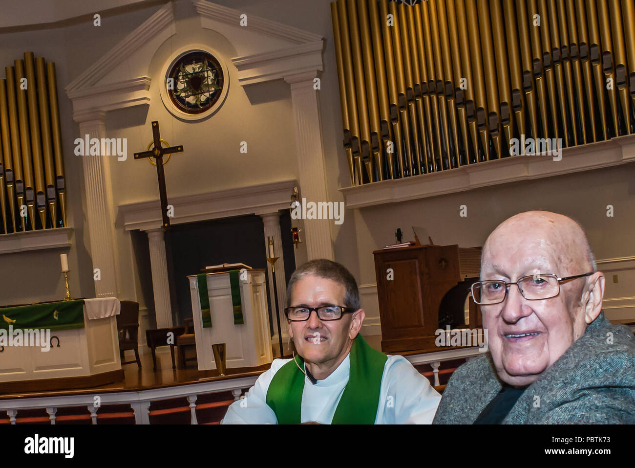 Pastor and congregational members Stock Photo - Alamy