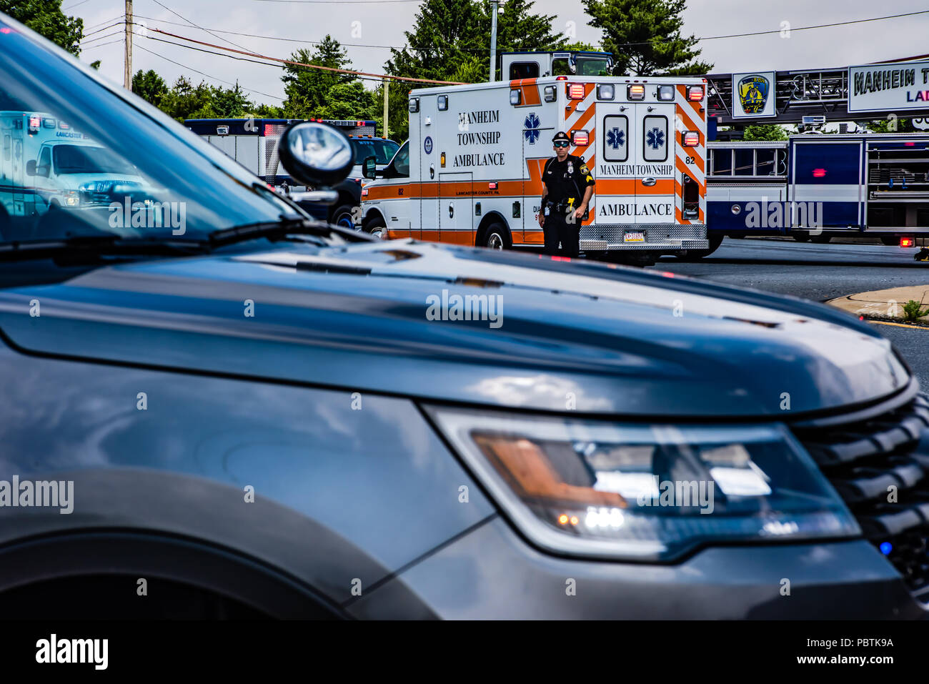 Overturned car at traffic accident scene near major highway on ramp ...