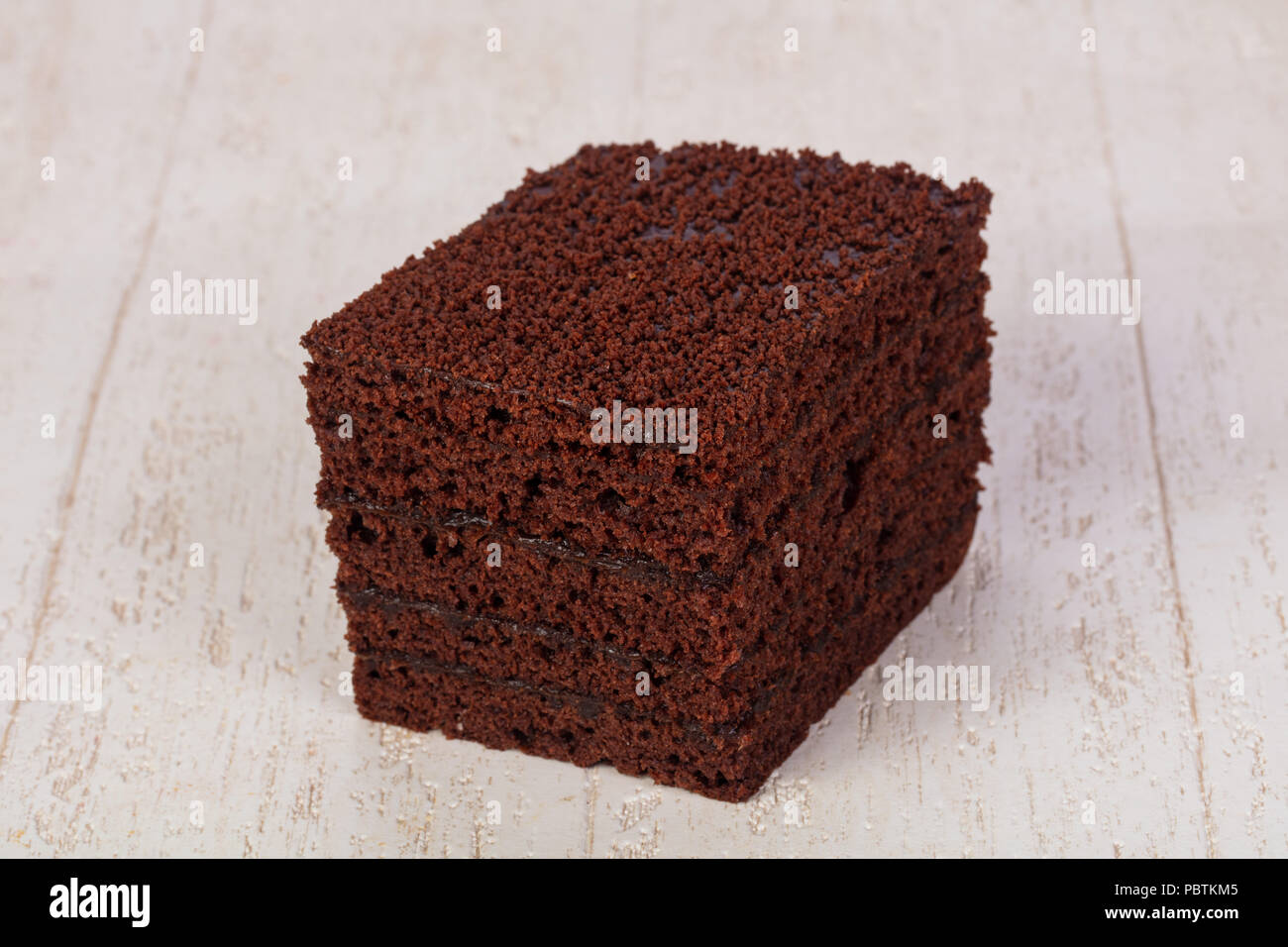 Tasty Sponge cake ower wooden background Stock Photo - Alamy
